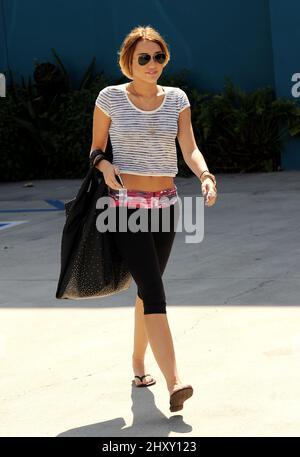 Miley Cyrus is seen leaving a pilates studio after her daily workout ...