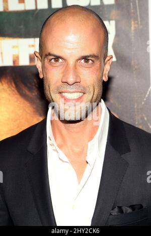 Christian George attending the 'Runner Runner' premiere held at Planet ...