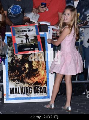Kyla Kenedy attending the premiere of season four of The Walking Dead ...