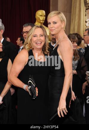 Charlize Theron and Gerda Maritz arriving at the 86th Academy Awards ...