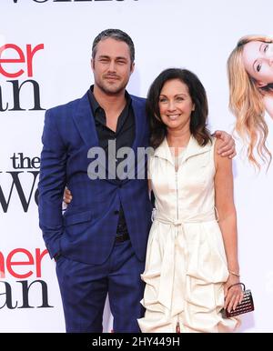 Taylor Kinney and Pamela Heisler arriving for the premiere of The Other ...