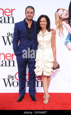 Taylor Kinney and Pamela Heisler arriving for the premiere of The Other ...