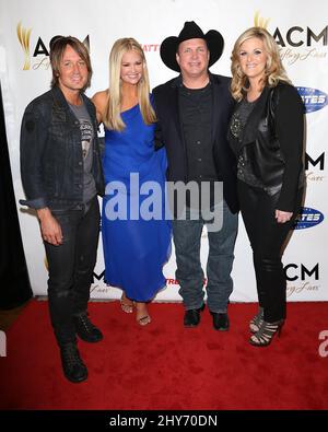 Keith Urban,Nancy O'Dell,Garth Brooks,Trisha Yearwood attending the ACM ...