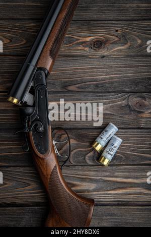 Opened classic hunting double barreled shotgun isolated on white ...