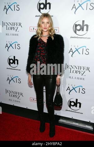 Rosie Huntington-Whiteley attending the Grand Opening of JENNIFER LOPEZ ...
