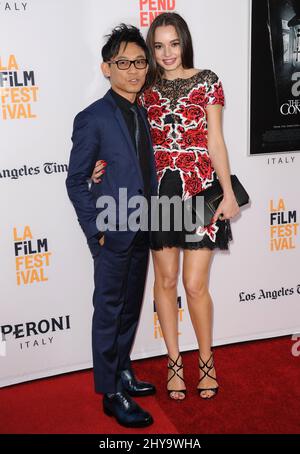 James Wan and Ingrid Bisu attending the premiere of Warner Bros ...