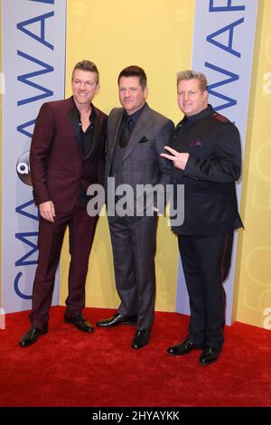 Joe Don Rooney and Jay DeMarcus of Rascal Flats walk the red carpet ...