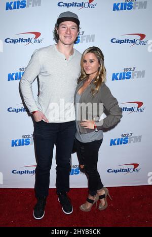 Tyler Toffoli and Taylore Bryce attending 102.7 KIIS FM's Jingle Ball ...