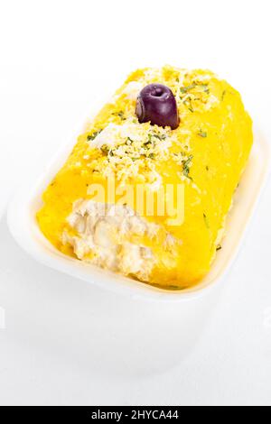 Closeup of a Peruvian food called causa made with chicken and mashed ...