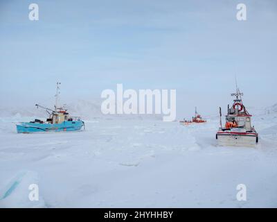 The harbour of Ikerasak near Uummannaq during winter in northern ...