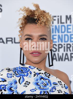 Emmy Raver-Lampman arrives at the Film Independent Spirit Awards in a ...