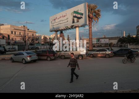 Idlib, Syria. 14th Mar, 2022. A large flag pole with the Syrian ...
