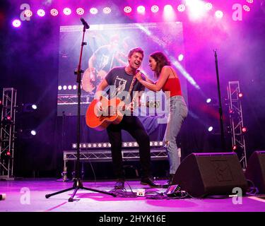 Tyler Hilton, Liz Huett performing onstage at the Pop 2000 Tour concert ...