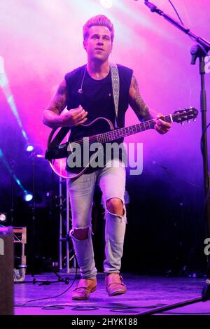 Ryan Cabrera performing onstage at the Pop 2000 Tour concert held at ...