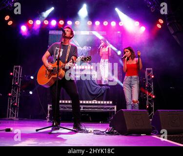 Tyler Hilton, Liz Huett performing onstage at the Pop 2000 Tour concert ...