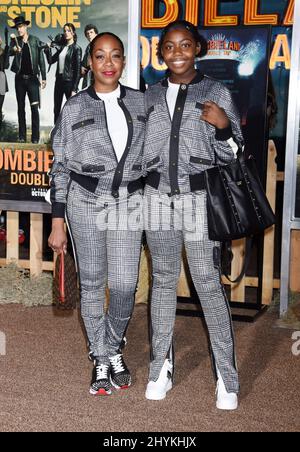 Alijah Kai Haggins and Tichina Arnold attend the arrivals of the “56th ...