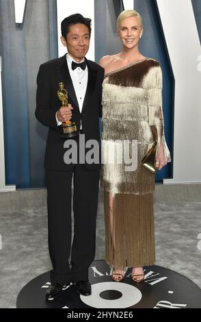Kazu Hiro and Charlize Theron attending the Vanity Fair Oscar Party ...