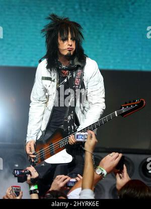 Nikki Sixx Motley Crue performing live at the Apollo Hammersmith London ...