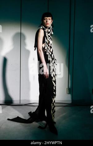 Tokyo, Japan. 15th Mar, 2022. A model wearing fashion brand PEIEN ...