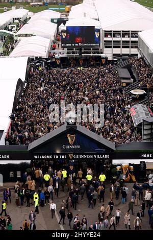 A general view of racegoers at The Guinness Village on day one of the ...