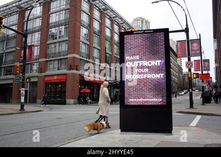 Advertising monitor on the street of Yaletown, Vancouver, British ...