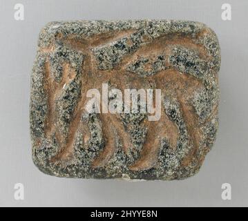 This gabled stamp, with a rounded back, is a tool used in ancient ...