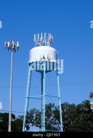 Water tank and signal towers and sky and clouds background Stock Photo ...
