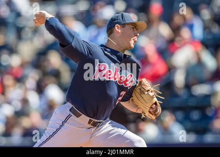 March 13, 2022: Ole Miss catcher Hayden Dunhurst (13) takes a swing ...