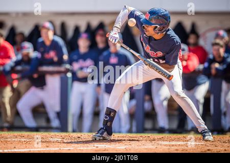March 13, 2022: Ole Miss catcher Hayden Dunhurst (13) takes a swing ...