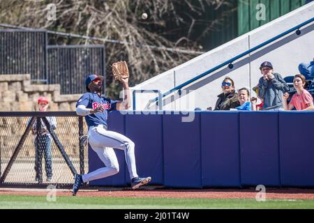 March 13, 2022: Ole Miss catcher Hayden Dunhurst (13) takes a swing ...