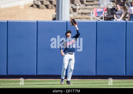 March 13, 2022: Ole Miss catcher Hayden Dunhurst (13) takes a swing ...