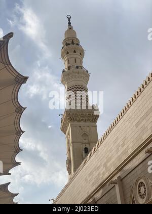 A vertical shot of a mosque on cloudy sky background Stock Photo - Alamy