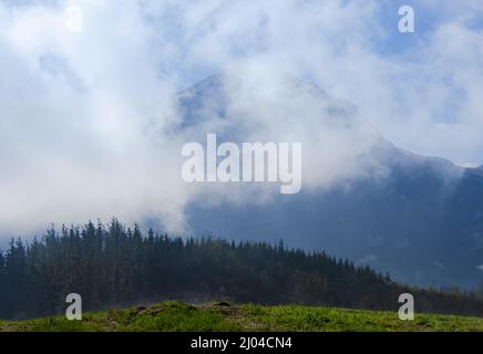 Mount Txindoki among the clouds in the Natural Park of the Aralar ...