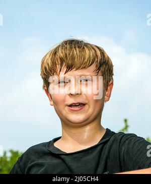 portrait of sweating boy after sports Stock Photo - Alamy