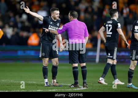 Sheffield United's Jack Robinson and referee John Busby during the Sky ...