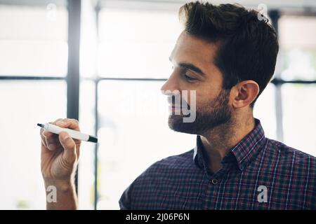 Let me write that down. Cropped shot of a handsome mature male operator ...