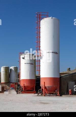 Storage tanks at Mi Swaco Minerals division, a Schlumberger company ...