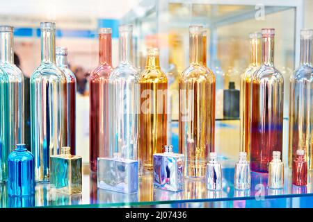 Colored reflex bottles on the shop window Stock Photo - Alamy