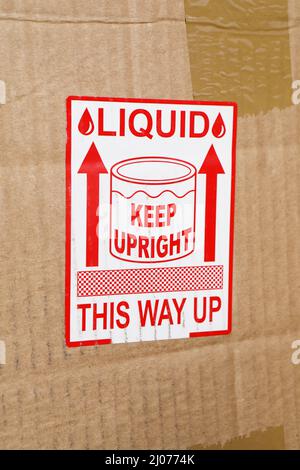Liquid, keep upright, packaging label Stock Photo - Alamy