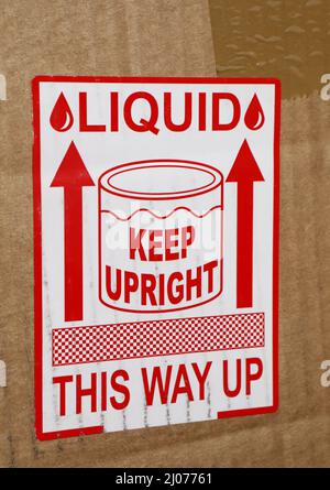 Liquid, keep upright, packaging label Stock Photo - Alamy