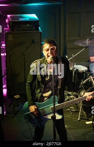 Bassist Pando performing with eighties New Wave band A Flock of ...