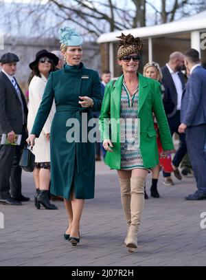 Zara Tindall (left), Dolly Maude and Anna Lisa Balding (right) react as ...