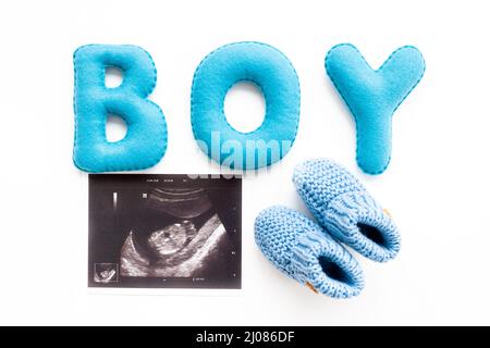 Ultrasound scan of unborn baby with letters boy Stock Photo - Alamy