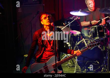 Bassist Pando performing with eighties New Wave band A Flock of ...