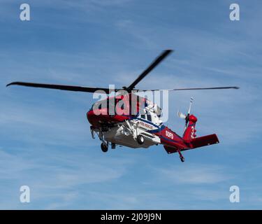 Fire department helicopter dropping water on a wildfire Stock Photo - Alamy