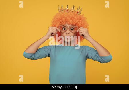 just having fun. fancy party look. egocentric kid in clown wig and ...