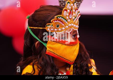 Indian Child wear face mask, Dressed As Hindu Lord Krishna, During The ...
