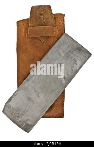 Vintage sharpening stone Stock Photo - Alamy
