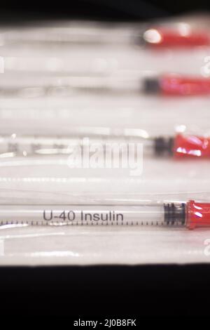 Pet cat and dog insulin injection syringes sealed in plastic with red ...