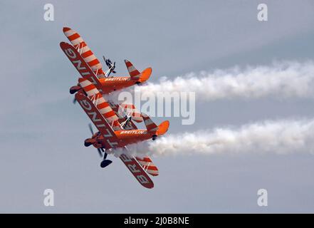 Biplane wing walkers at airshow Stock Photo - Alamy